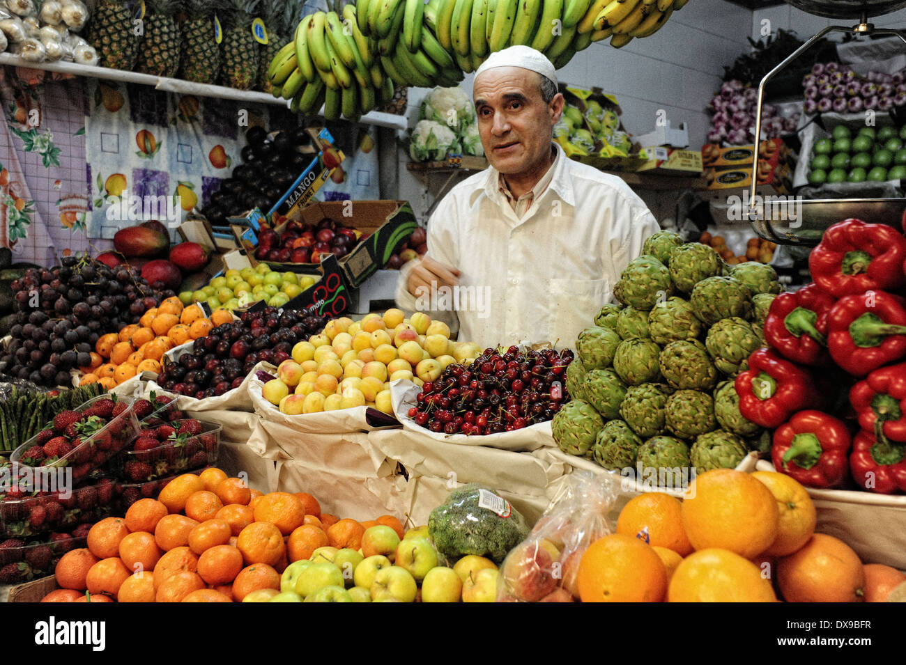 Muslim seller in a fruit shop at the Mercado Central de Abastos. Ceuta ...