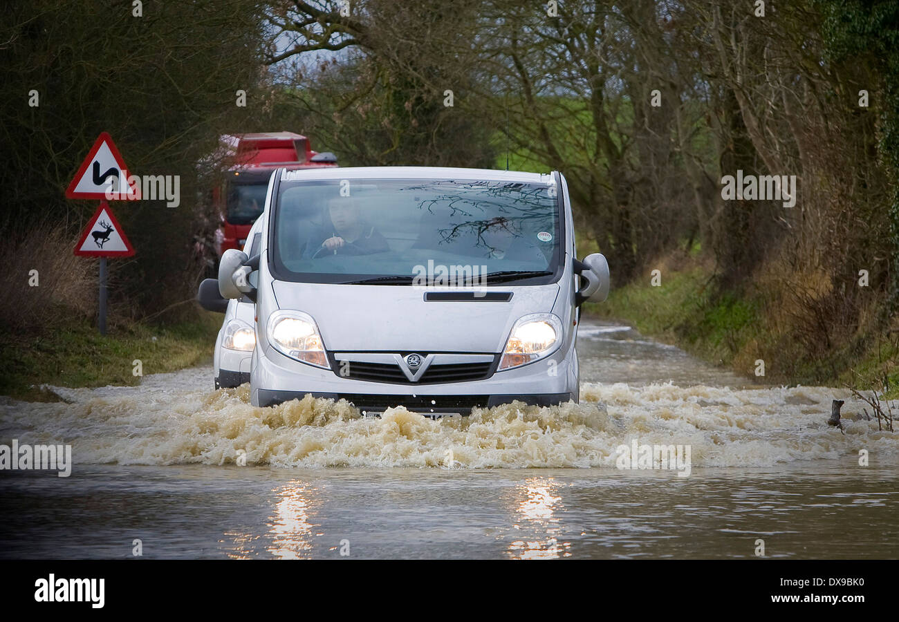 Cars struggle through Floods water in Steeple Bumpstead Essex today ...