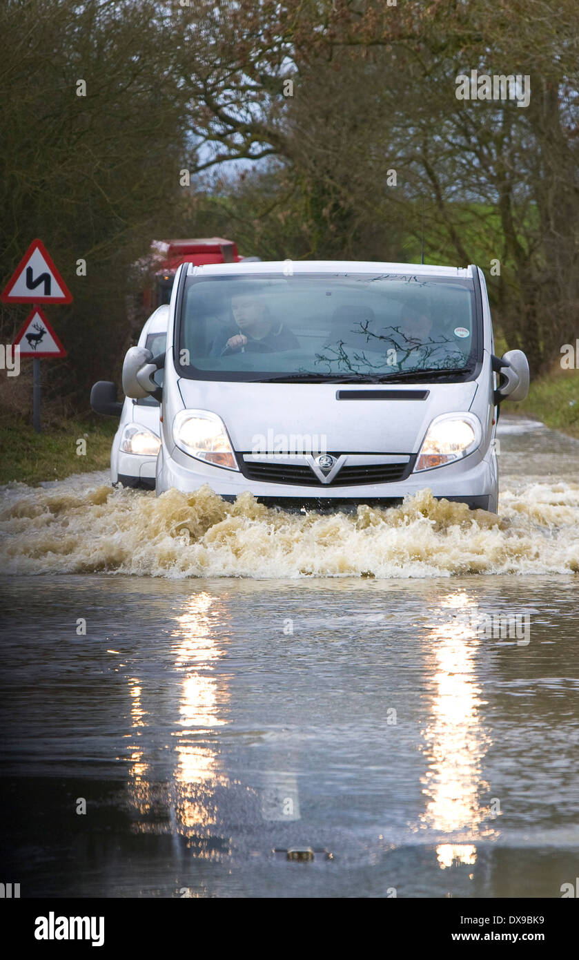 Cars struggle through Floods water in Steeple Bumpstead Essex today ...