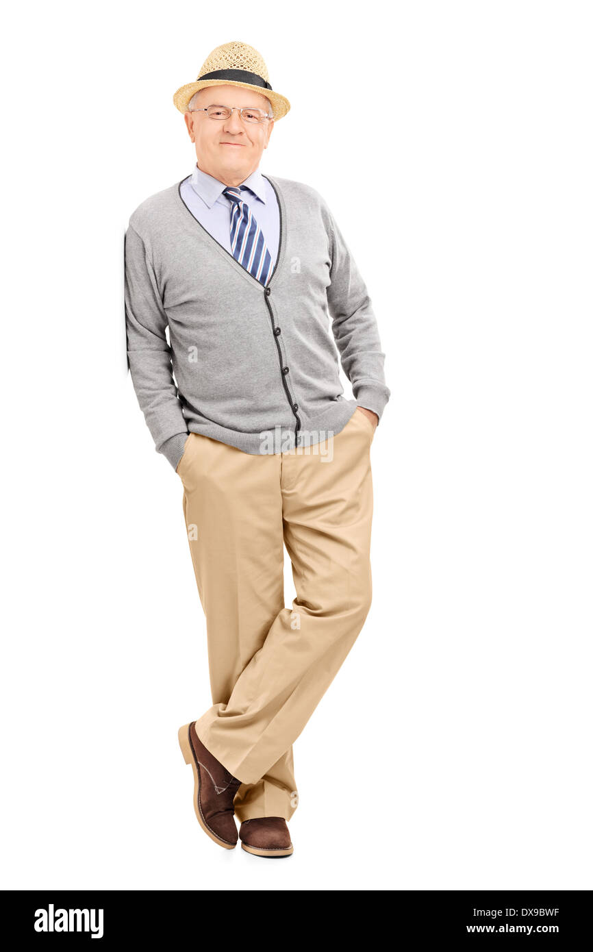 Old man leaning against wall Cut Out Stock Images & Pictures - Alamy