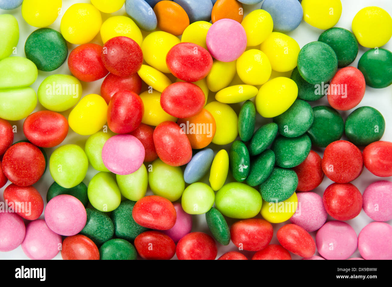 Round coloured sweets hi-res stock photography and images - Alamy