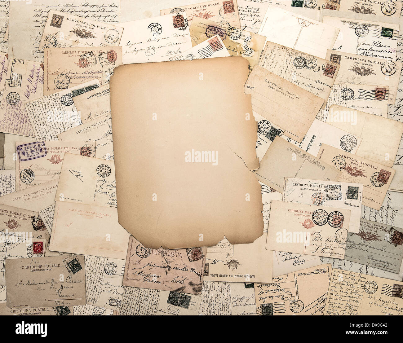 nostalgic vintage background with old handwritten post cards and grungy ...