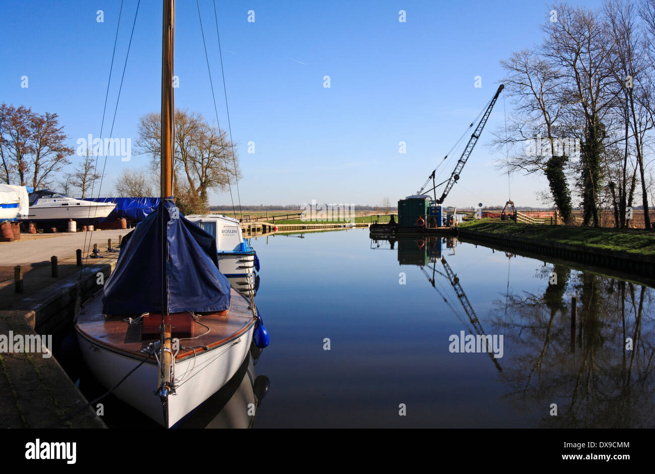 A view of Upton Dyke with dredging pontoon on the Norfolk Broads at ...