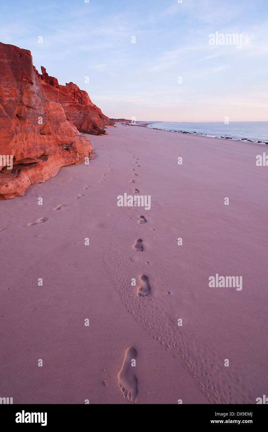 Footsteps in the sand Stock Photo - Alamy