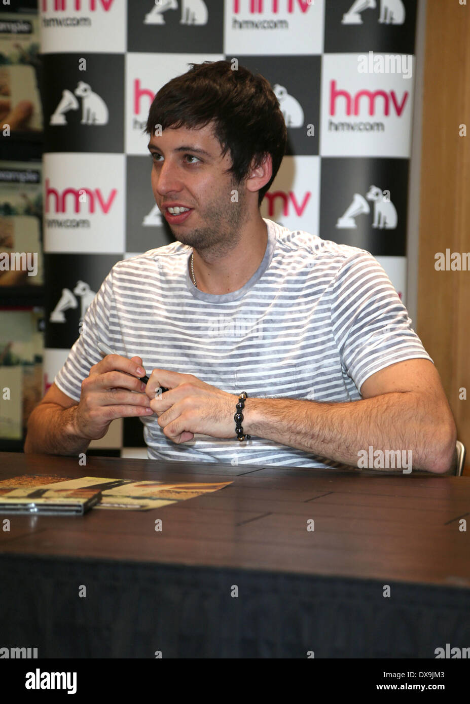 Example signs copies of his new album 'The Evolution of Man' at HMV ...