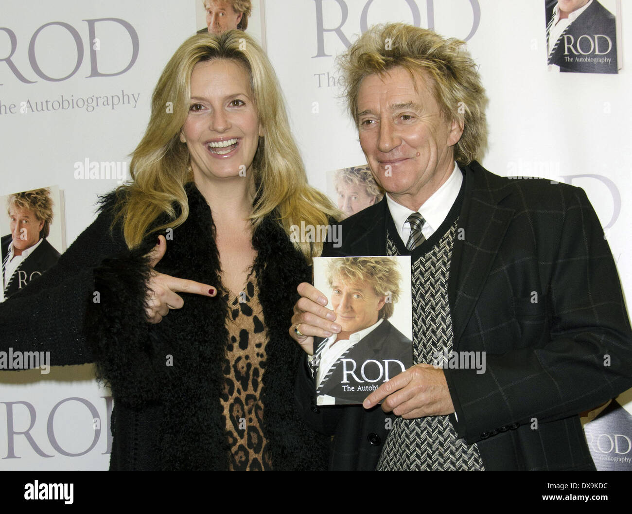 Penny Lancaster and Rod Stewart Rod Stewart signs copies of his book ...