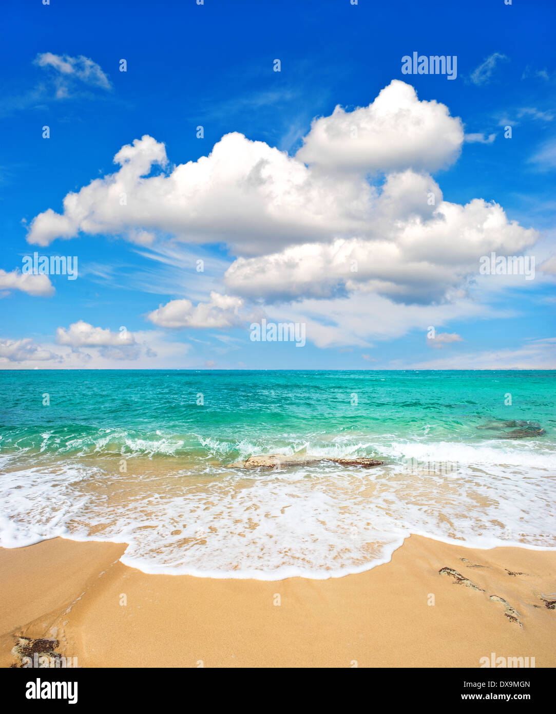 beautiful turquoise sea and perfect blue sky with white clouds. summer ...