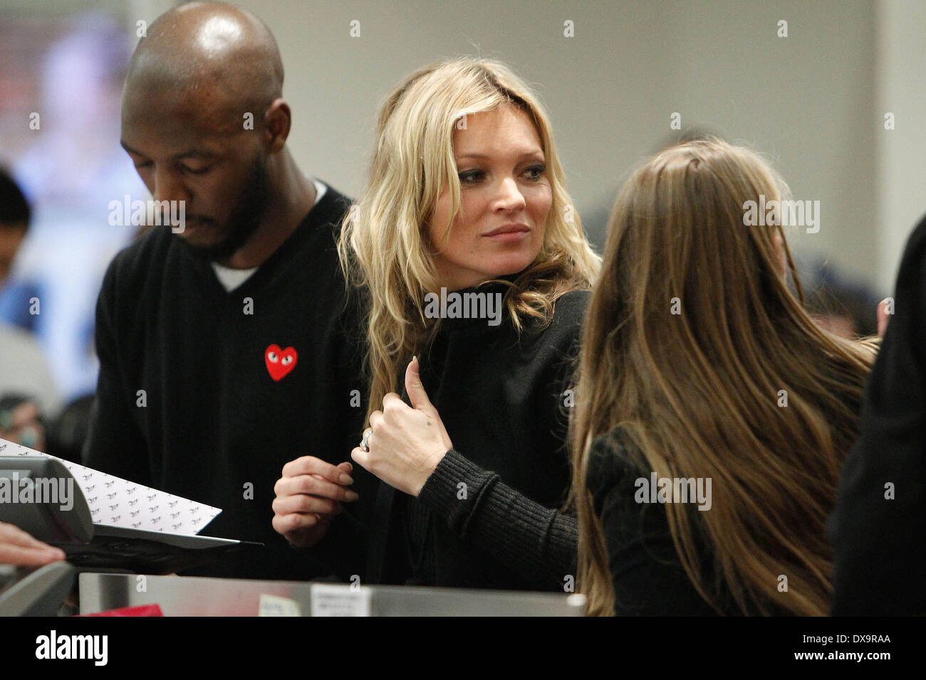 Kate Moss during her book signing at Colette's store in Paris Featuring ...