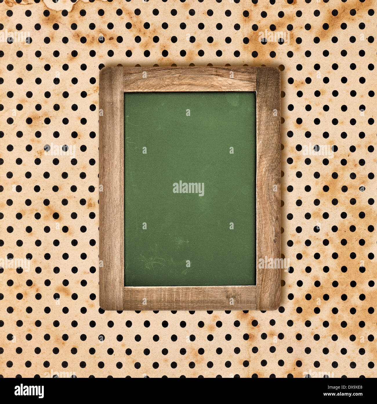 antique green chalkboard with wooden frame over vintage polka dot ...