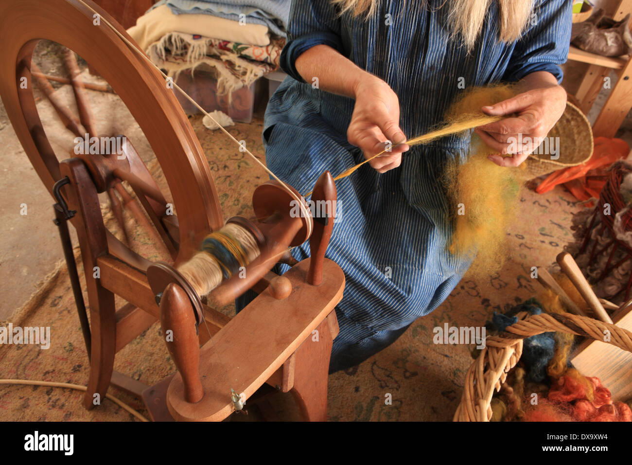 Jane Meredith,using a Spinning Wheel in her workshop, she runs courses ...