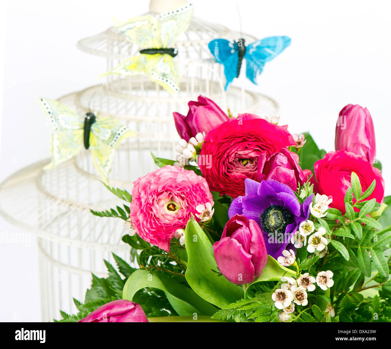 colorful spring flowers bouquet with butterflies Stock Photo - Alamy