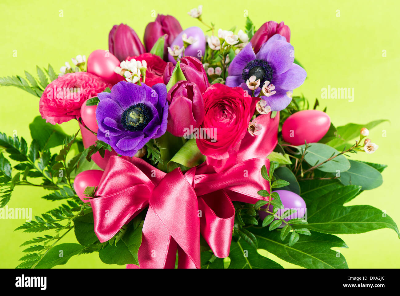 bouquet of colorful spring flowers with easter eggs Stock Photo - Alamy
