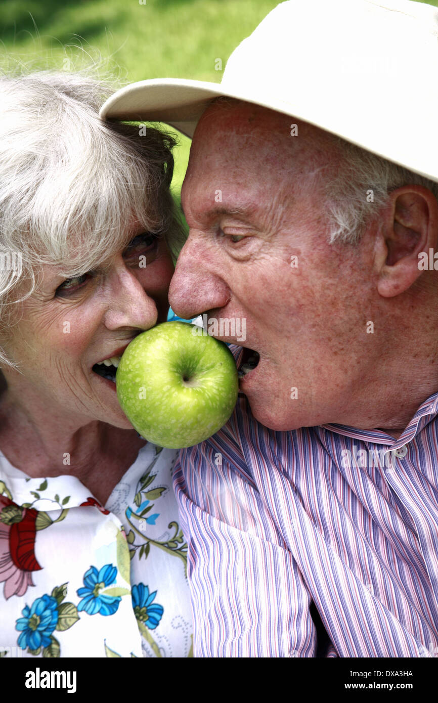 Humans Eating An Apple