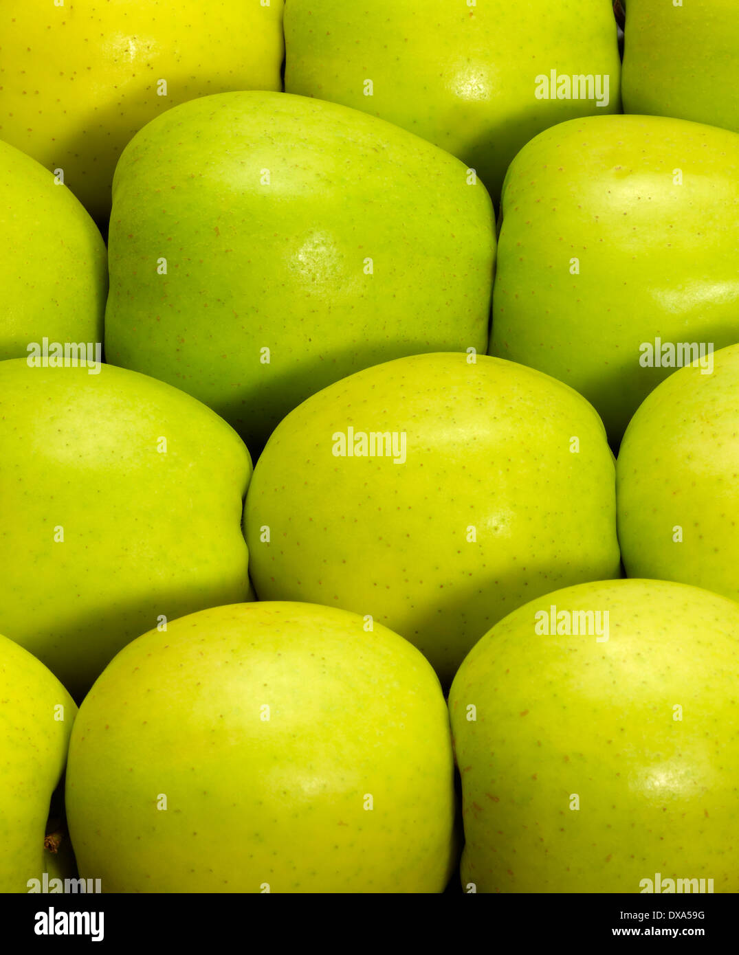 lots of green apples side by side Stock Photo - Alamy