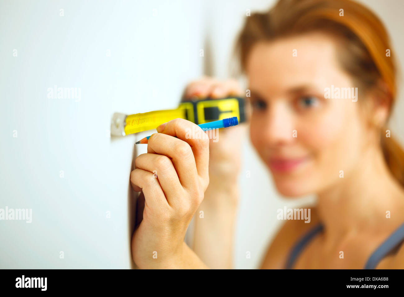 Woman with ruler hi-res stock photography and images - Alamy