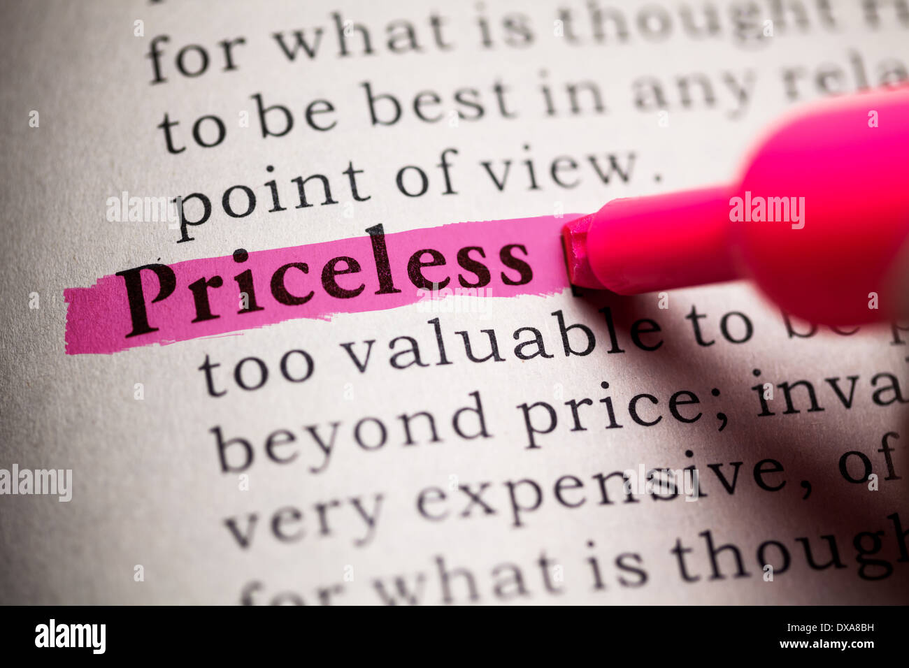 Fake Dictionary, definition of the word Priceless Stock Photo - Alamy
