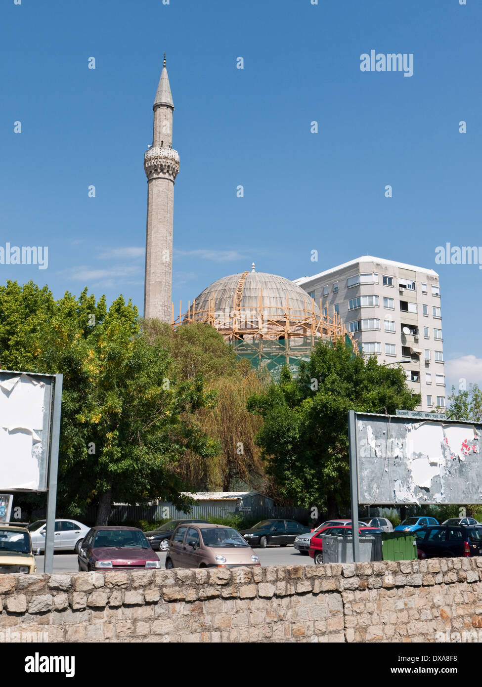 Building work with primitive wooden scaffold on the Isak mosque, city ...
