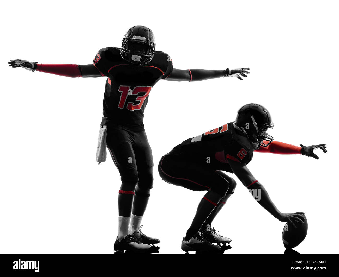 two american football players on scrimmage in silhouette shadow white ...