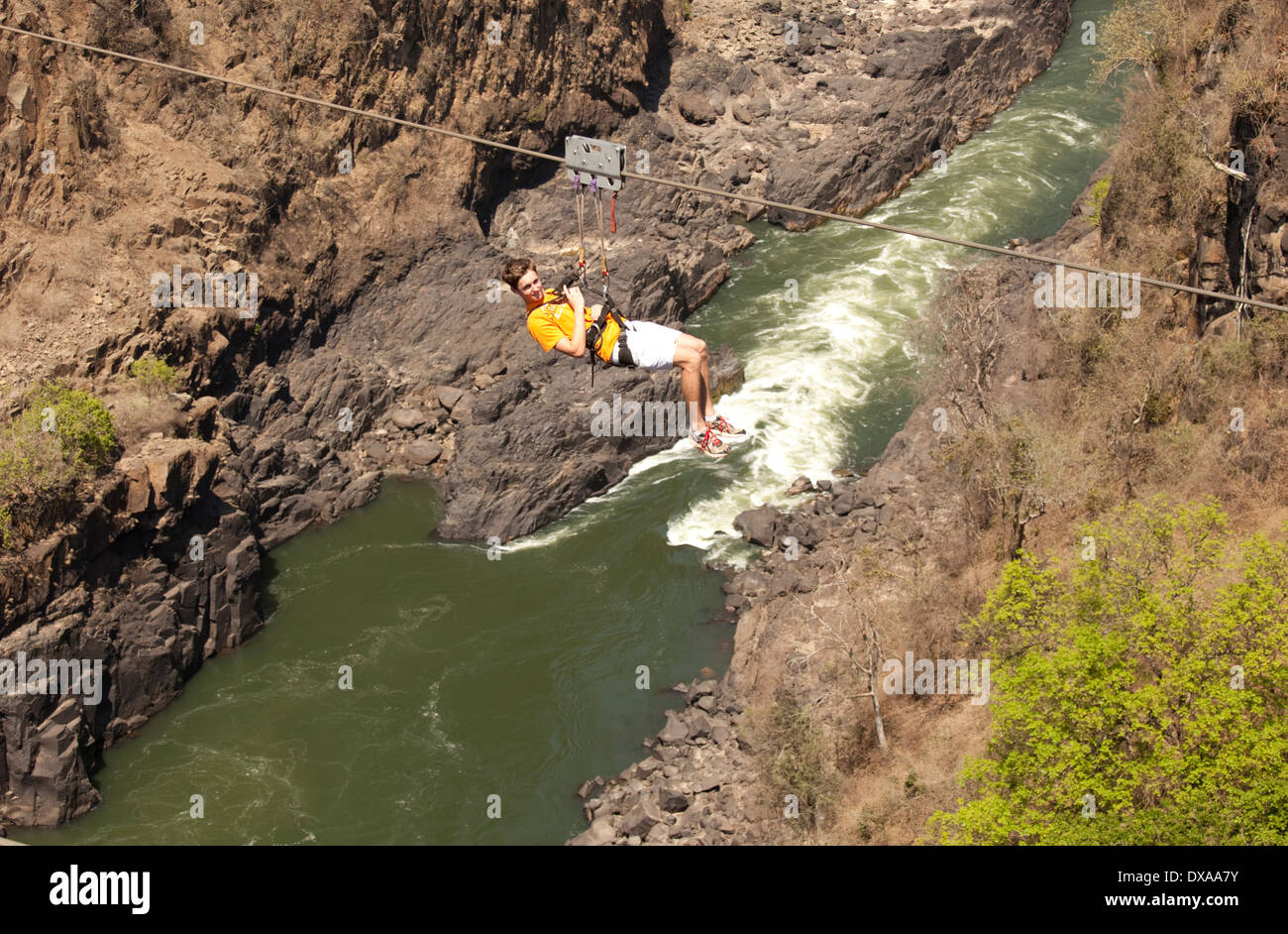Teenager on high wire gorge swing Victoria Falls Livingstone Zambia ...