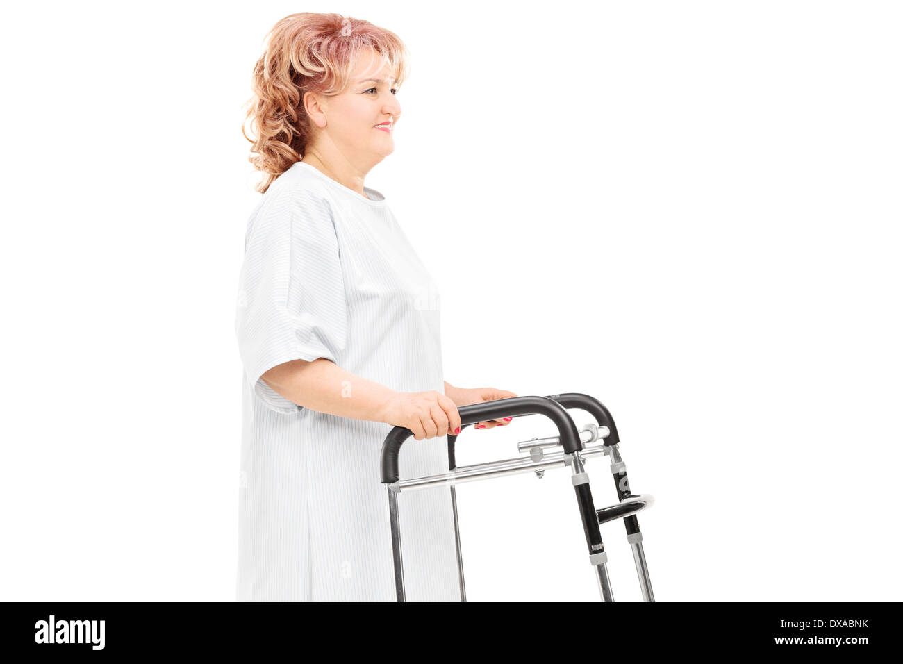 Female patient walking with walker Stock Photo - Alamy