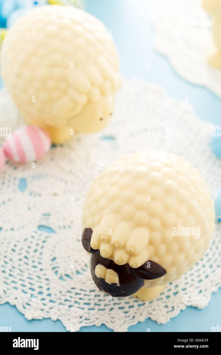 Easter chocolate sheep mafe of white chocolate Stock Photo - Alamy