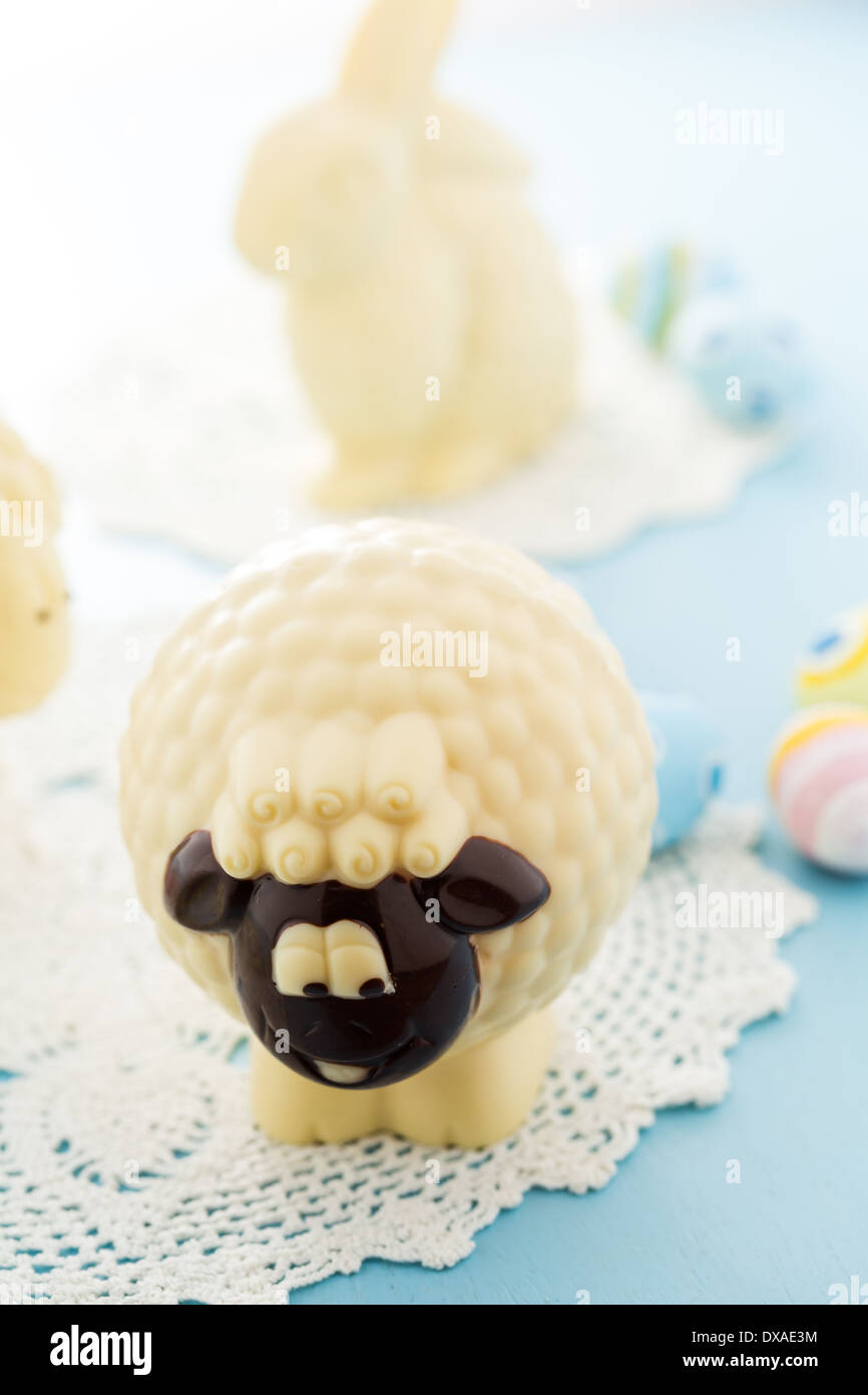 Easter chocolate sheep mafe of white chocolate Stock Photo - Alamy