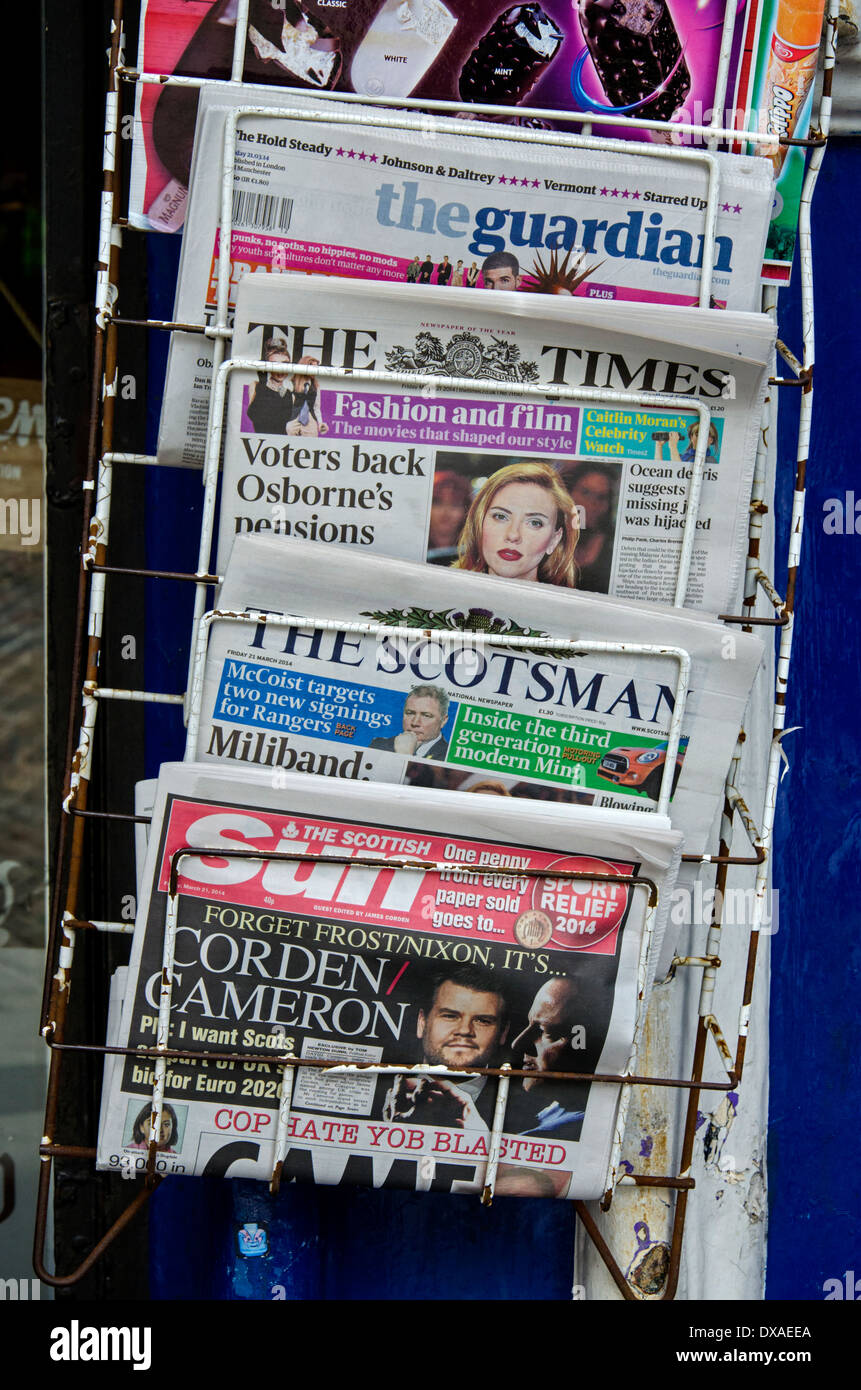 Selection of newspapers on rack hi-res stock photography and images - Alamy