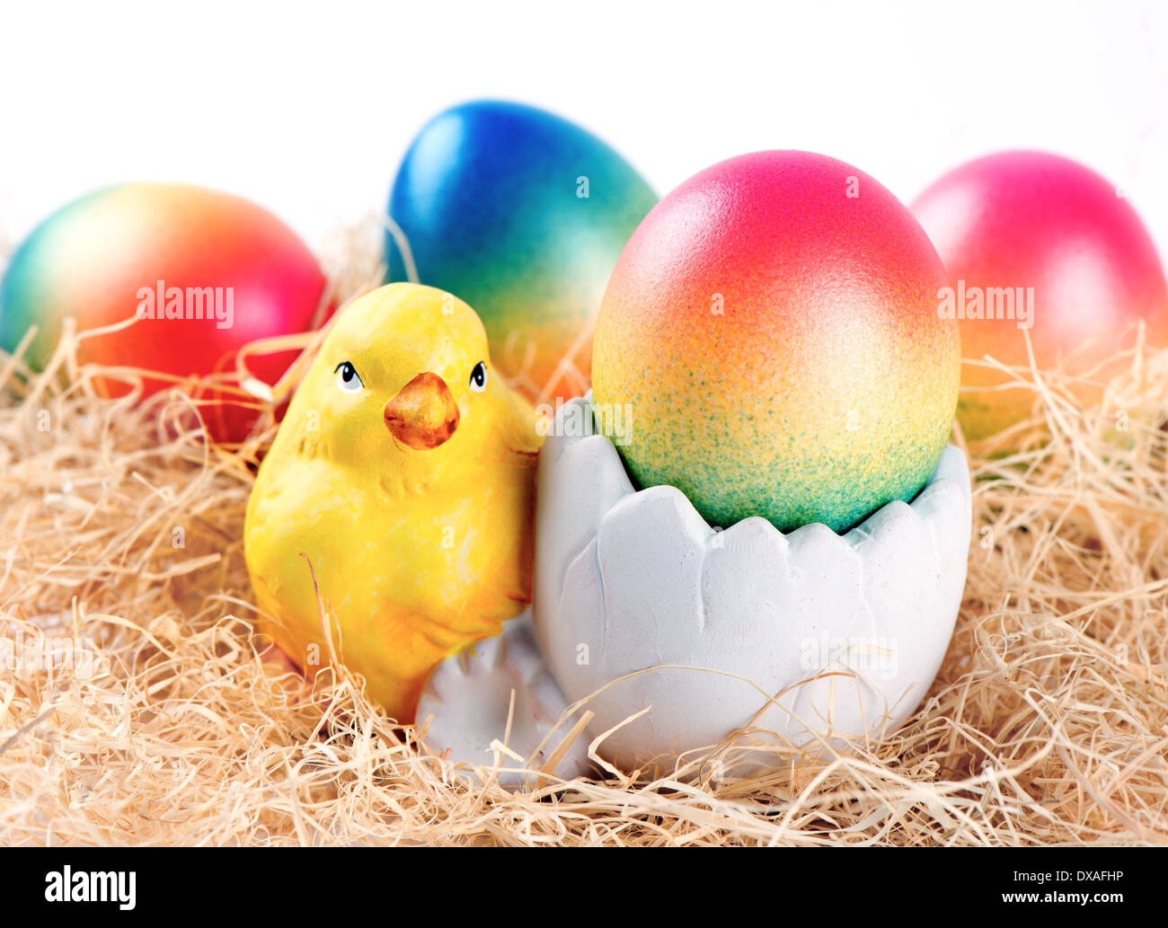 Easter chicken and colorful easter eggs Stock Photo - Alamy