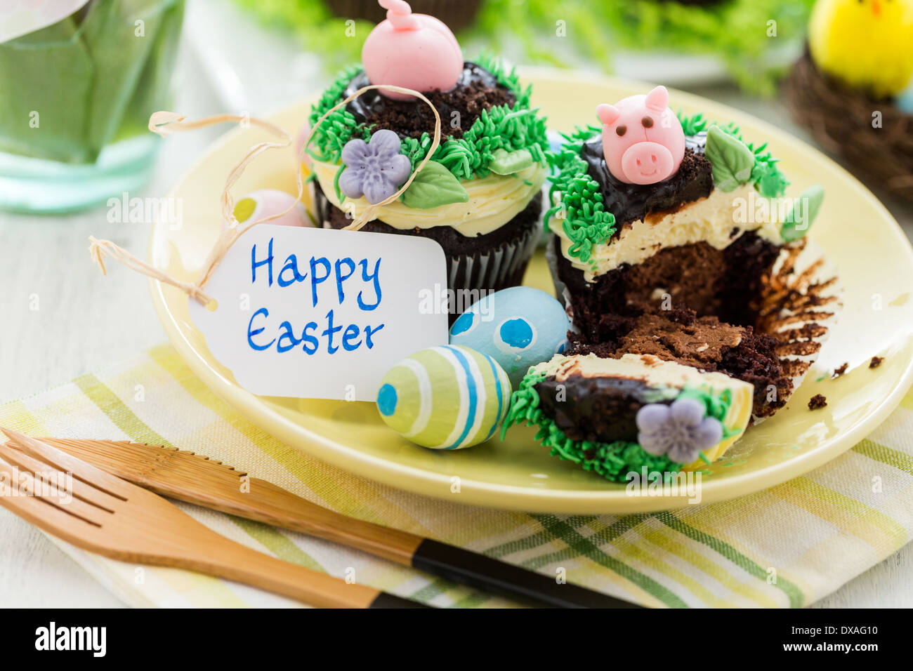 Easter chocolate cupcakes decorated with piggy and bunny ears Stock ...