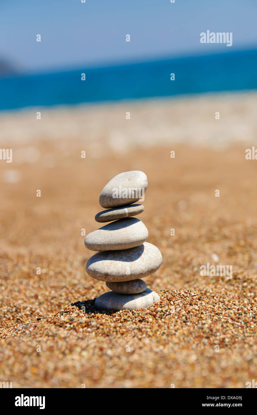 Cairn on the sand Stock Photo - Alamy