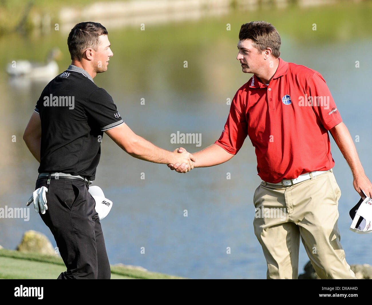 Orlando, Florida, USA. 21st March 2014. Luke Guthrie shakes hands with ...