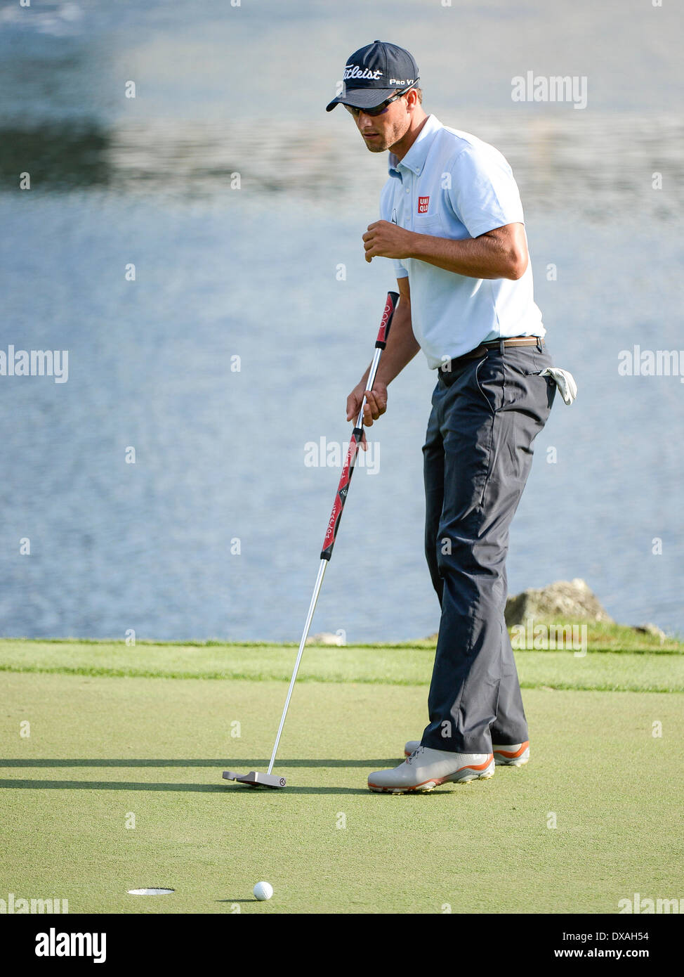Orlando, Florida, USA. 21st March 2014. Adam Scott reacts to his par ...
