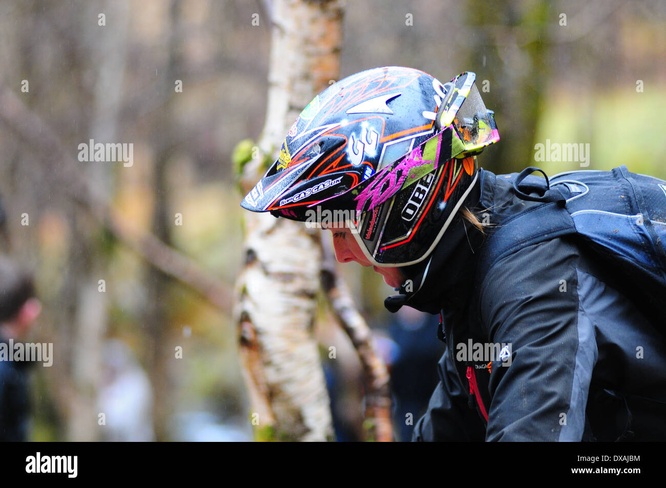 A lady competing in a trials bike competition Stock Photo - Alamy