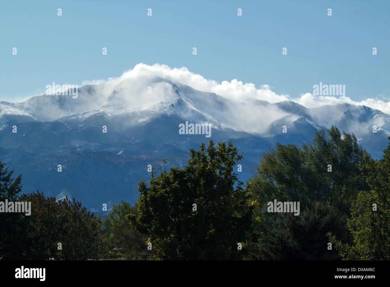 Wind-driven clouds appear to boil over the top of Pikes Peak in Colorado USA Stock Photo - Alamy