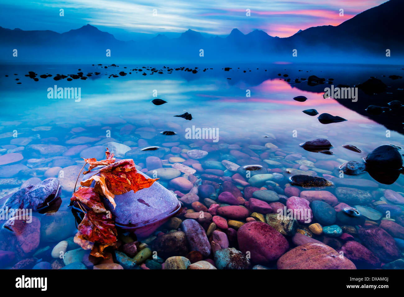 An early fall morning on Lake McDonald in the Glacier National Park in ...