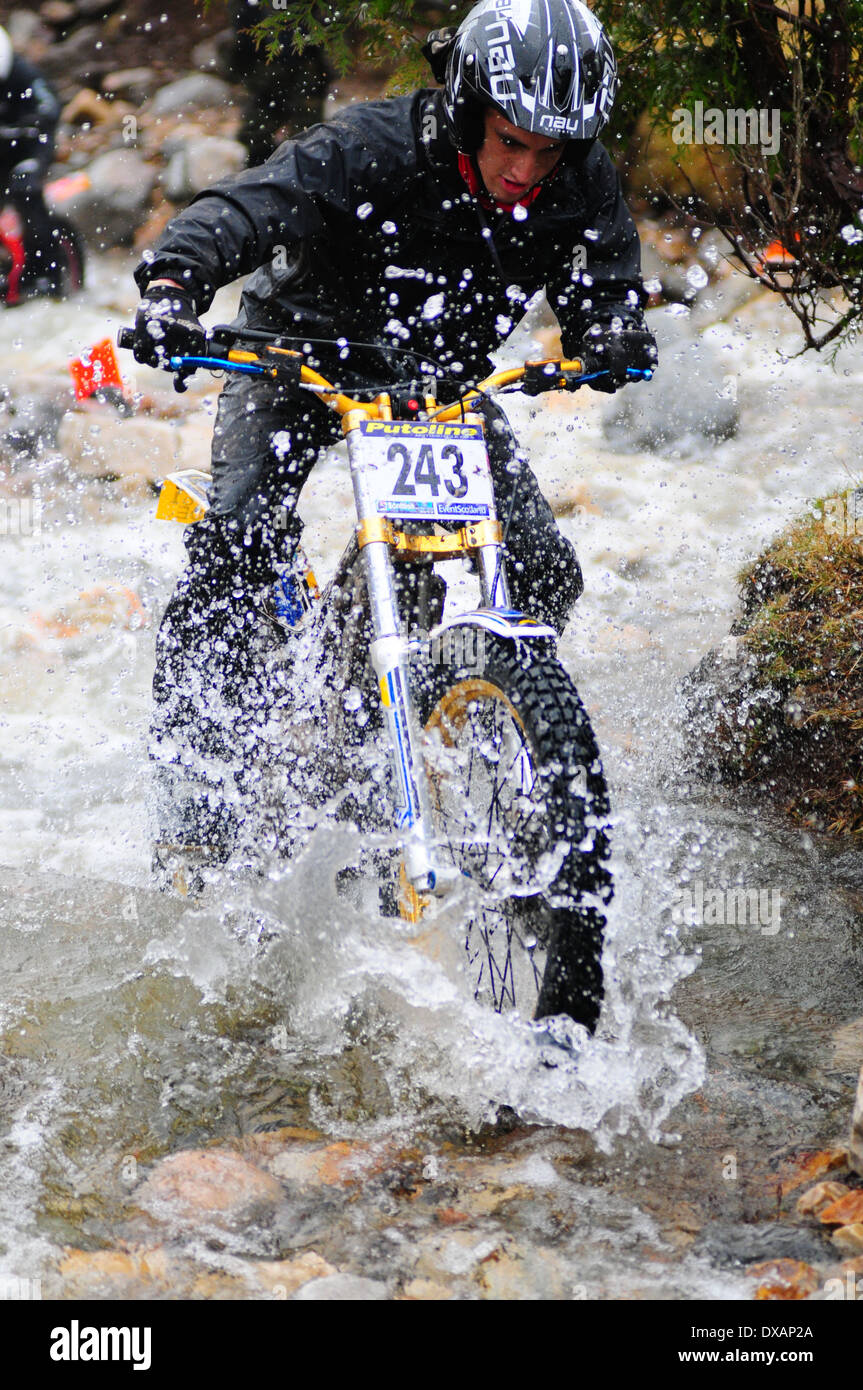 Trials motobike driving in a river Stock Photo - Alamy