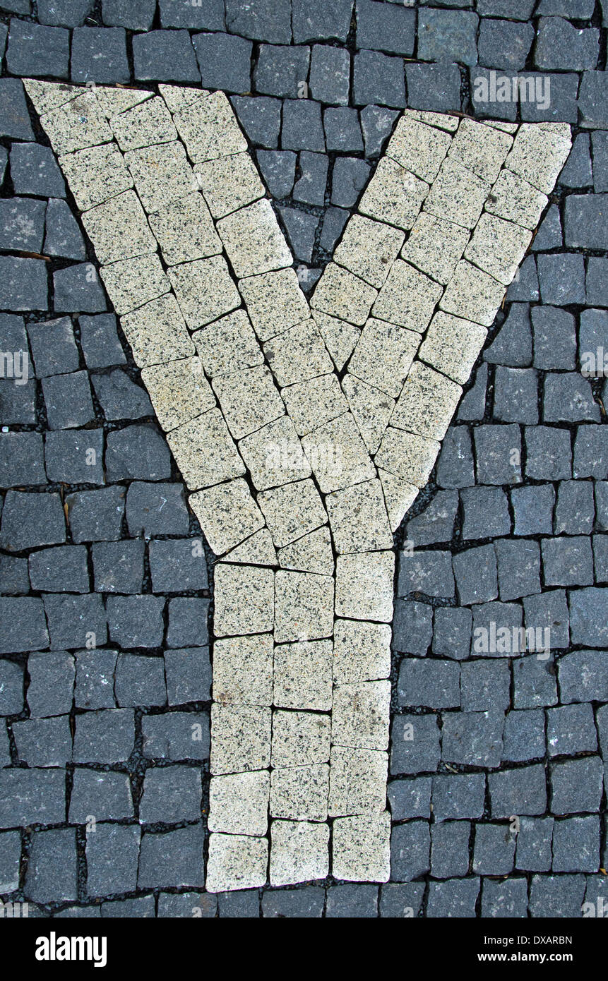 Photo of sidewalk made of stones with letters Stock Photo - Alamy