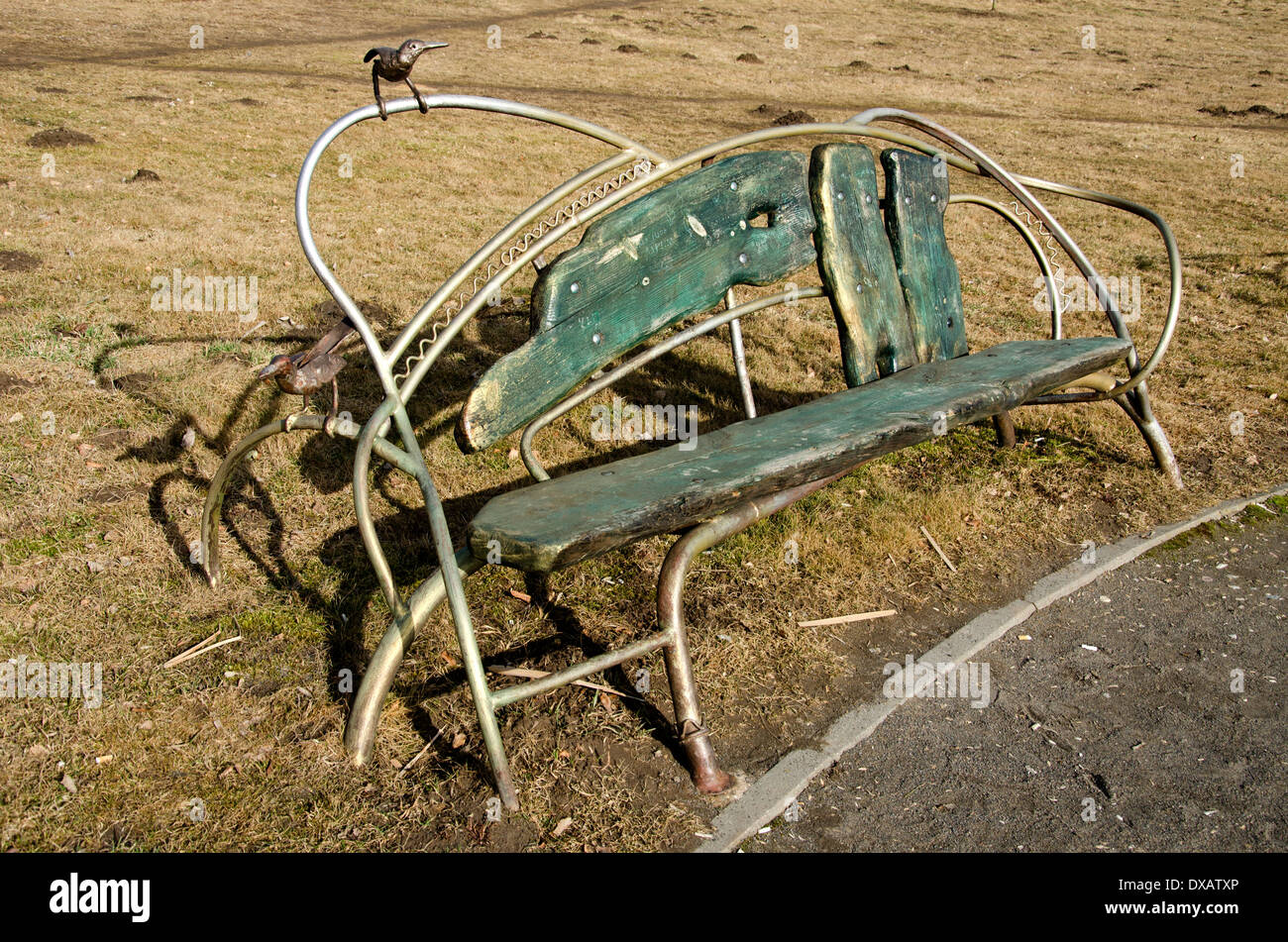 decorative bench in springtime resort park Stock Photo - Alamy
