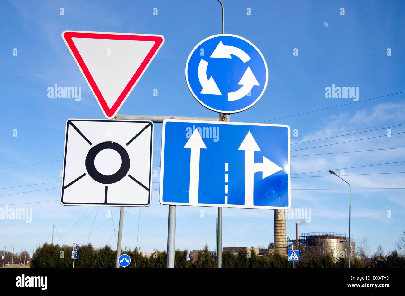 various road sign in city street on sky background Stock Photo - Alamy