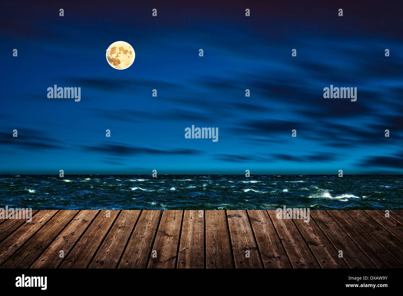 Stormy sea at night with blue sky and moon Stock Photo - Alamy