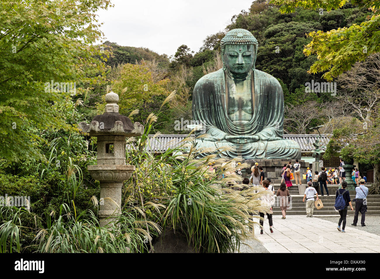 The Great Buddha of Kamakura (Daibutsu) with stone lantern in ...