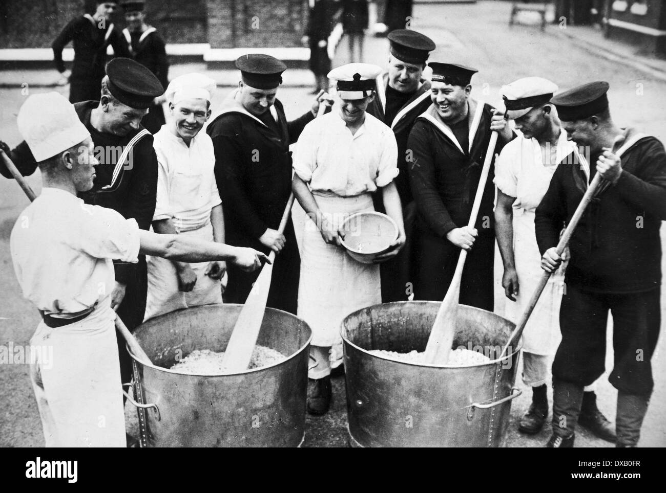 Royal Navy sailors stir the Christmas pudding Stock Photo - Alamy