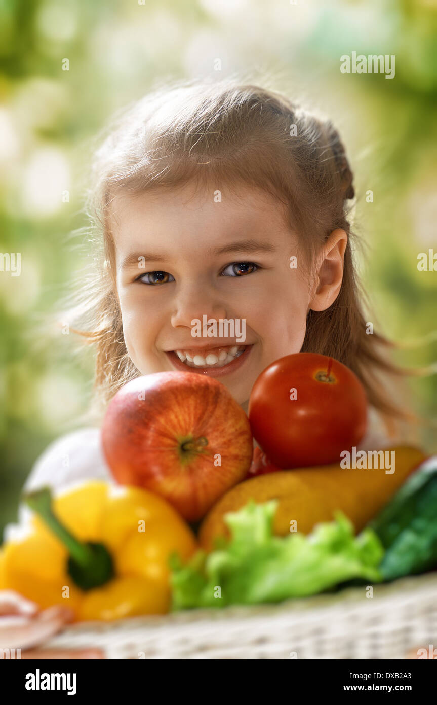 girl holding a fresh vegetables Stock Photo - Alamy