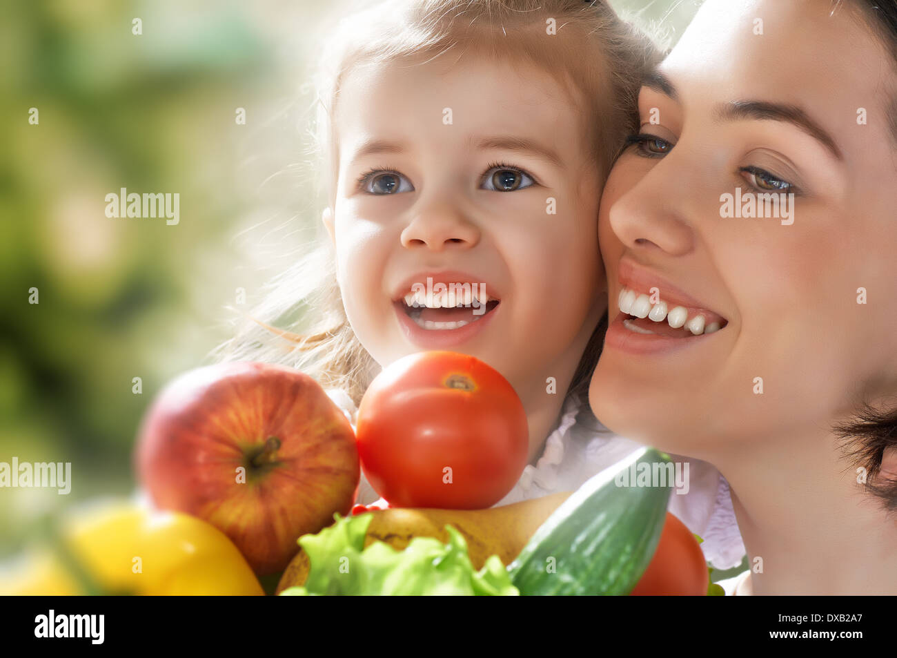 happy family keeps fresh vegetables Stock Photo - Alamy