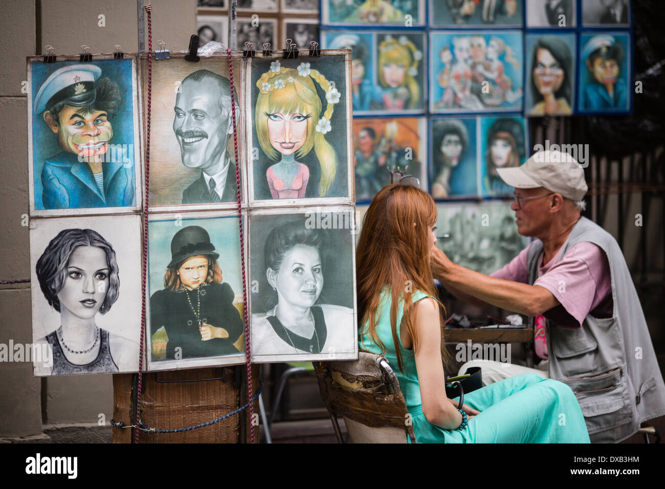 Russian street artist drawing portrait hi-res stock photography and ...