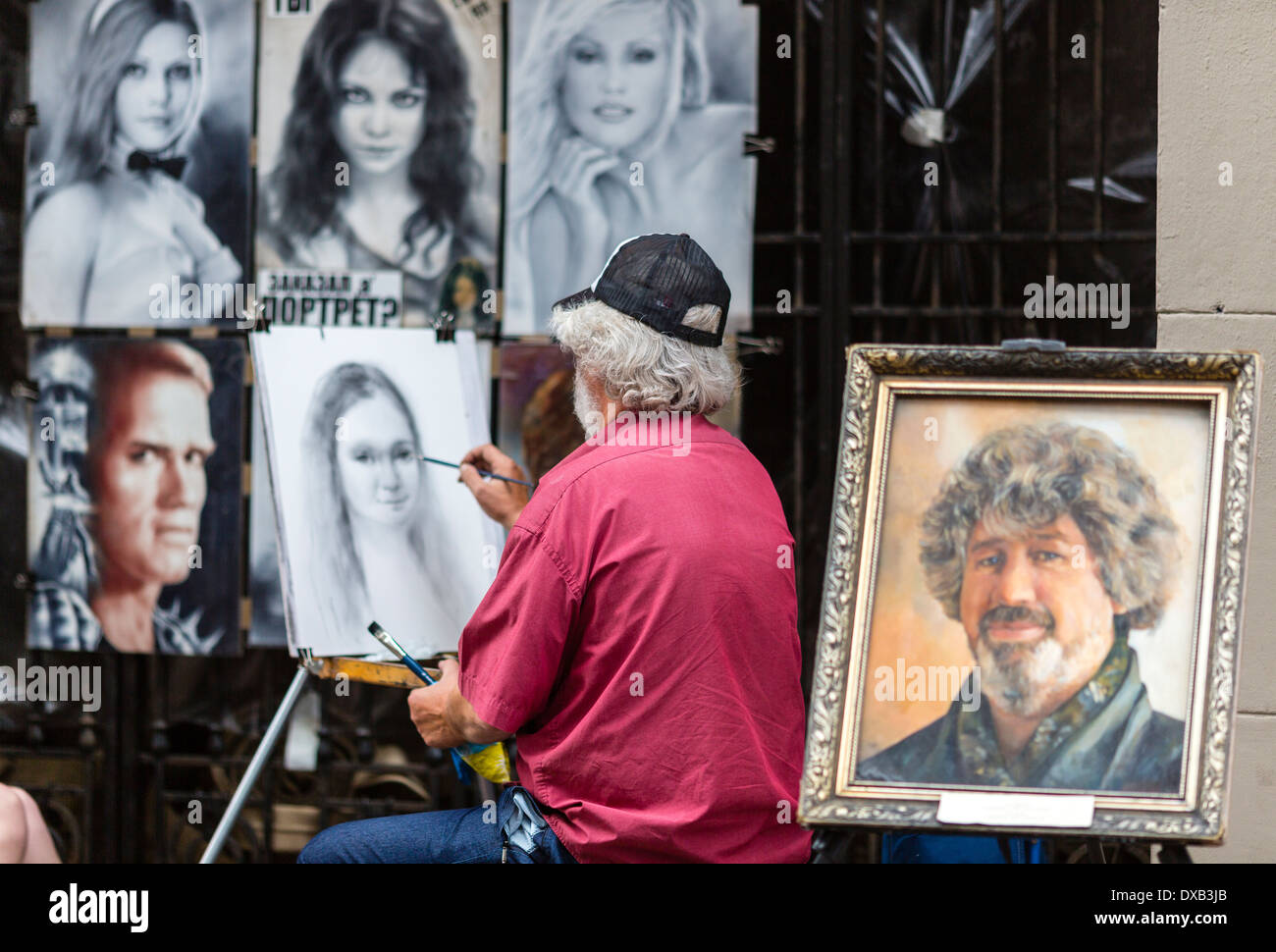 Portrait drawn by artist in Arbat Street, Moscow, Russia Stock Photo ...