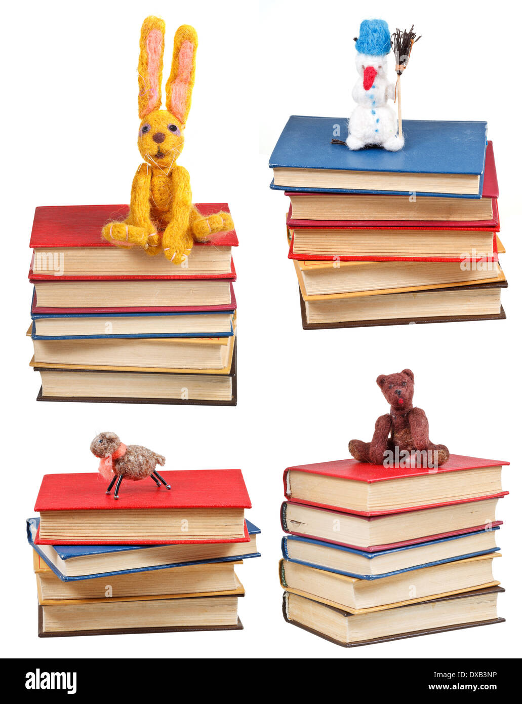 set of felt soft toys on stack of books isolated on white background ...
