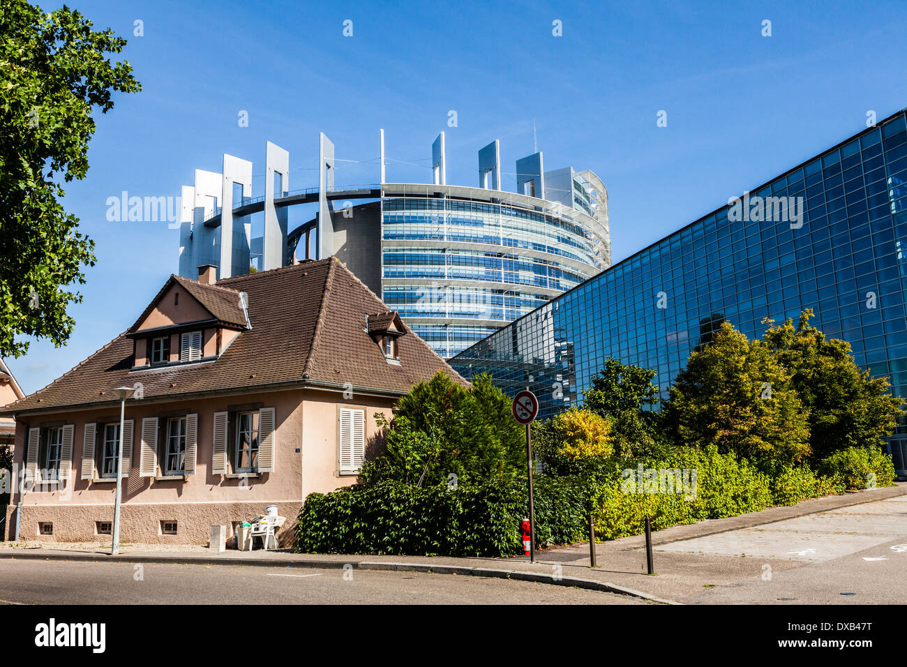 Huge European Parliament building overshadowing local house, Strasbourg ...