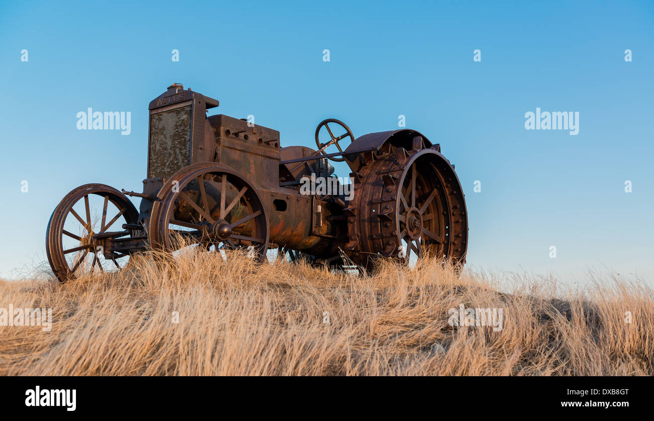 Tractor on a hill Stock Photo - Alamy