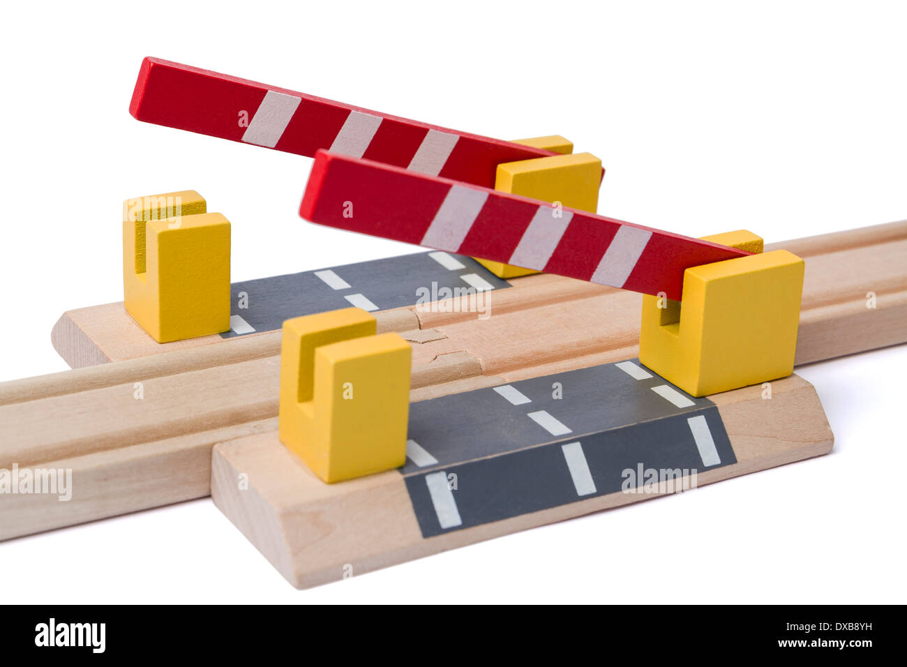 barrier is opening to give way over wooden railroad track Stock Photo ...